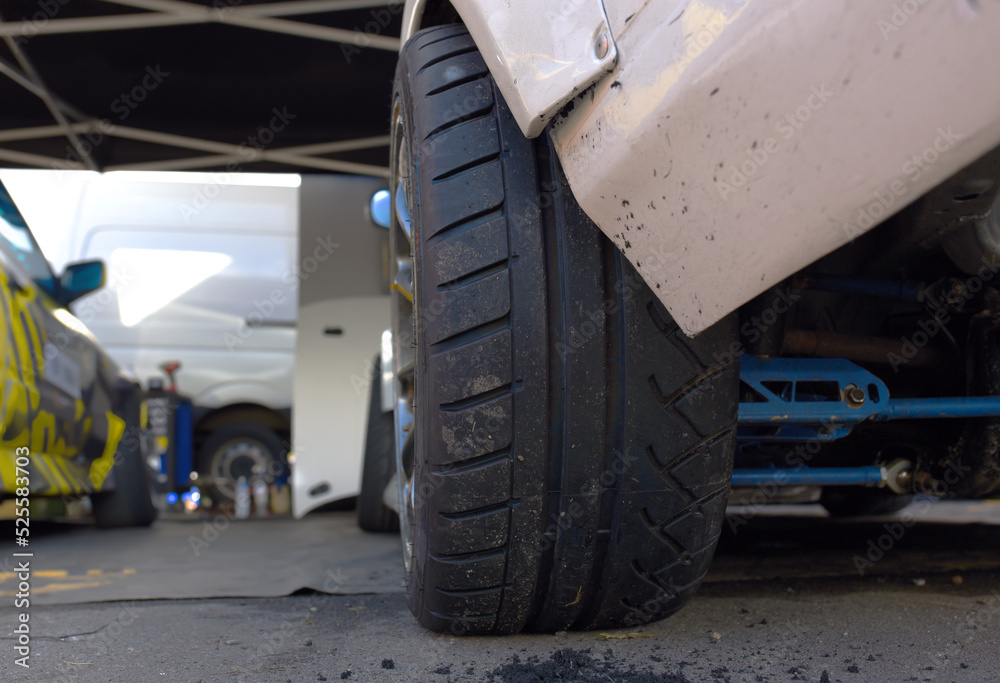 Tires of race car for driving. Drag and drift car with lower-profile ...