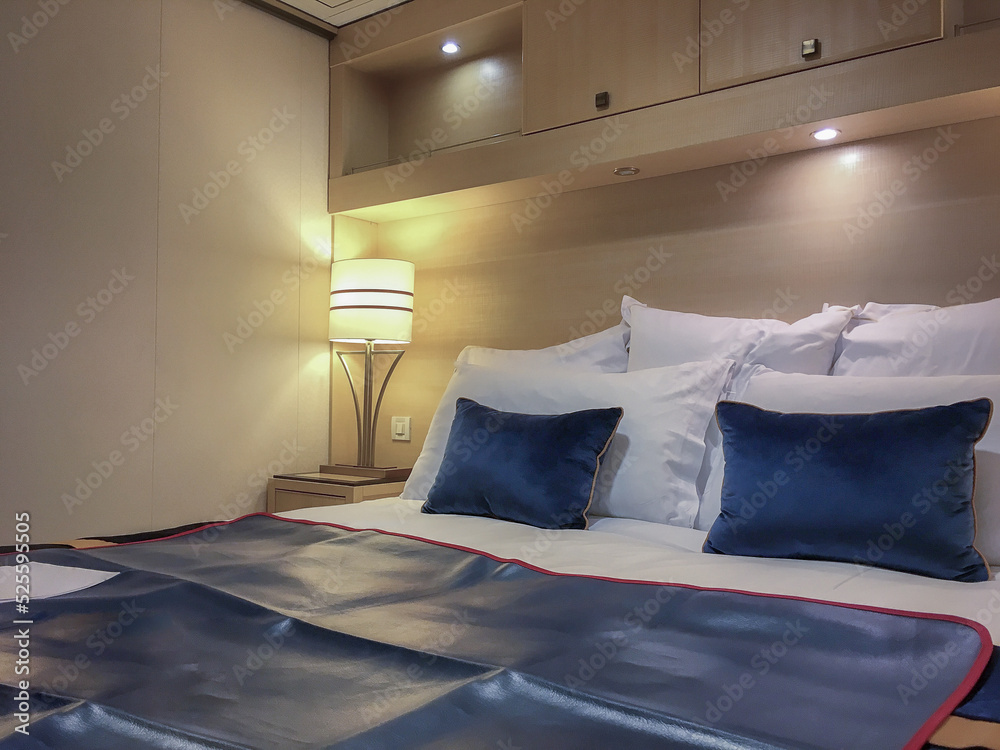 Luxurious interior or inside cabin stateroom. with queen king bed on ...