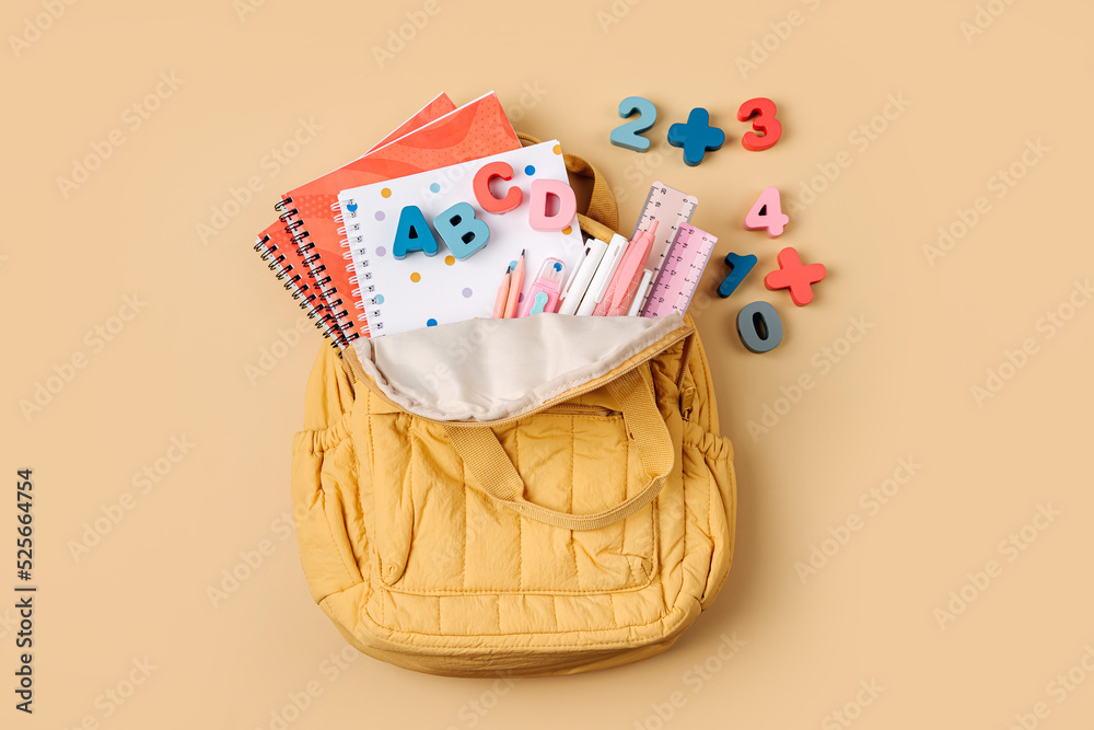 Opened School backpack with stationery. Primary school or preschool ...
