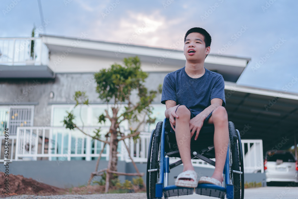 Young man with disability with happy face in front of home,hospital ...
