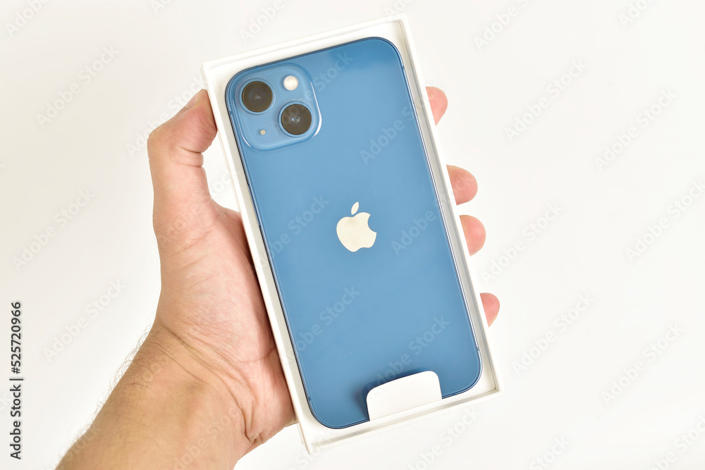Hand holding latest iphone 13 in box isolated on white background Stock ...