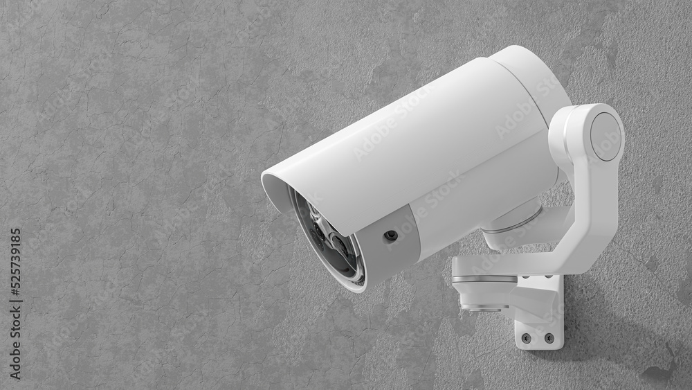 CCTV camera on cement wall. Scan the area for surveillance purposes ...