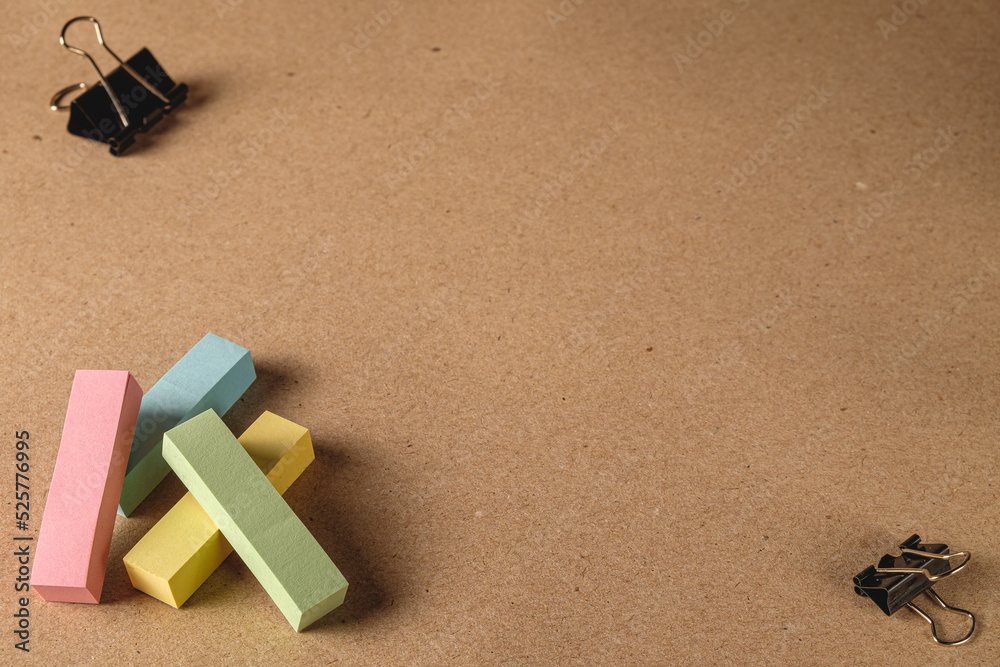 School office stationery on a brown paper background with space for ...