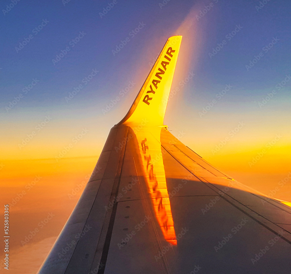 logo Ryanair, low-cost european airline visible on the wing tip during ...