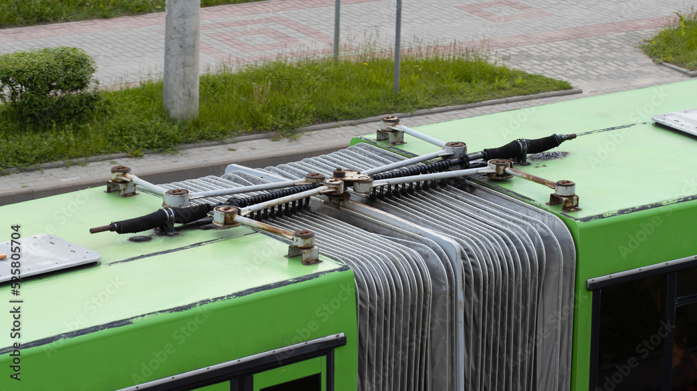 Long accordion bus for transporting people. Mounting system and tail ...