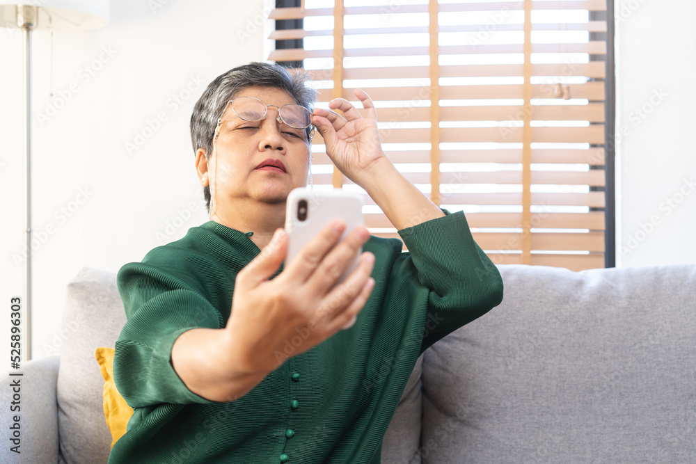 Presbyopia, Hyperopia mature asian woman holding eyeglasses having ...