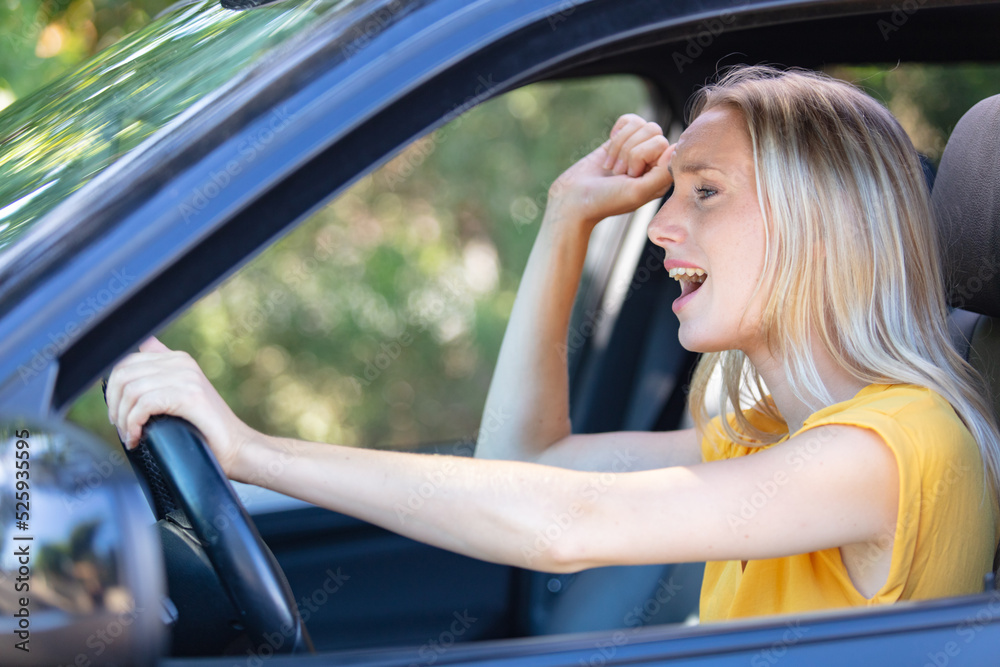side view window portrait displeased stressed angry woman driving car ...