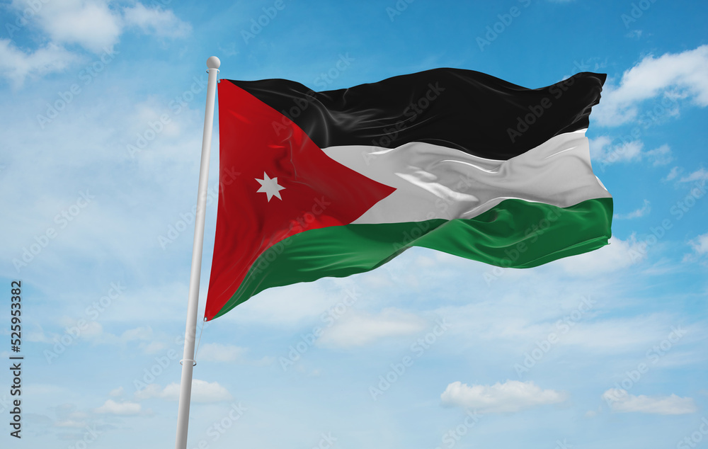 flag of Arab peoples Jordanians at cloudy sky background, panoramic ...