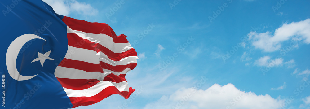 flag of Austronesian peoples Chams at cloudy sky background, panoramic ...