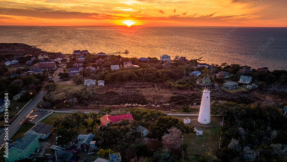 Ocracoke Lighthouse on Ocracoke , North Carolina at sunset.The ...