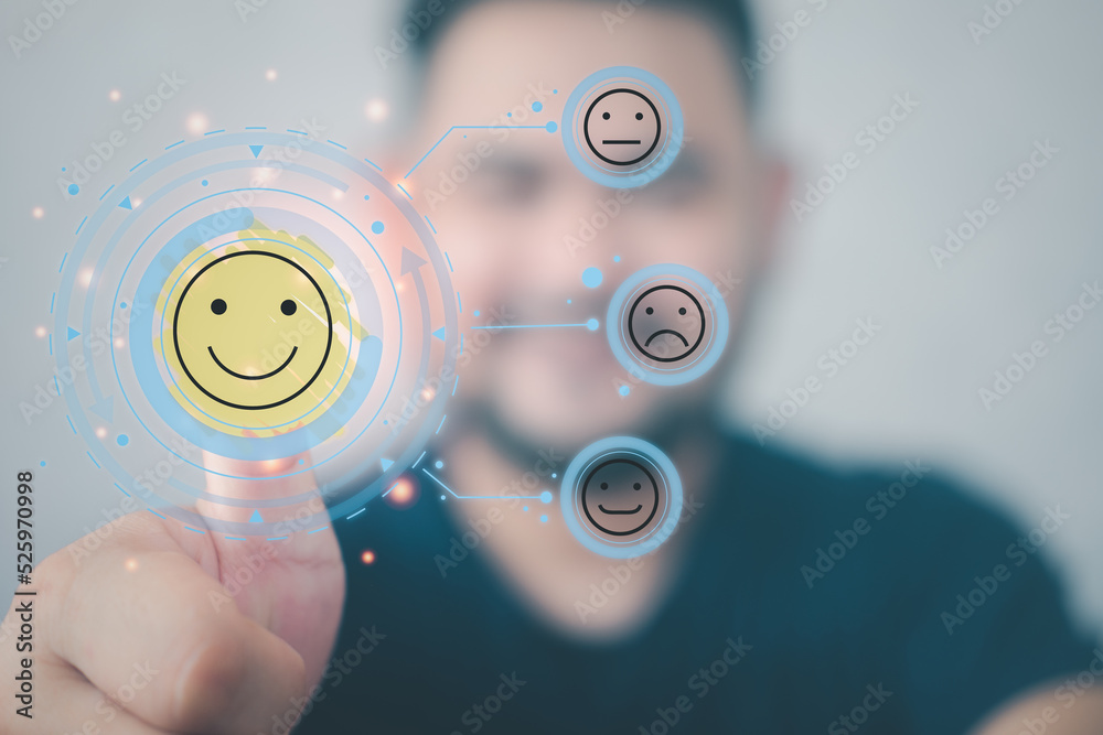 Hand of a man chooses a happy face, The best excellent business ...