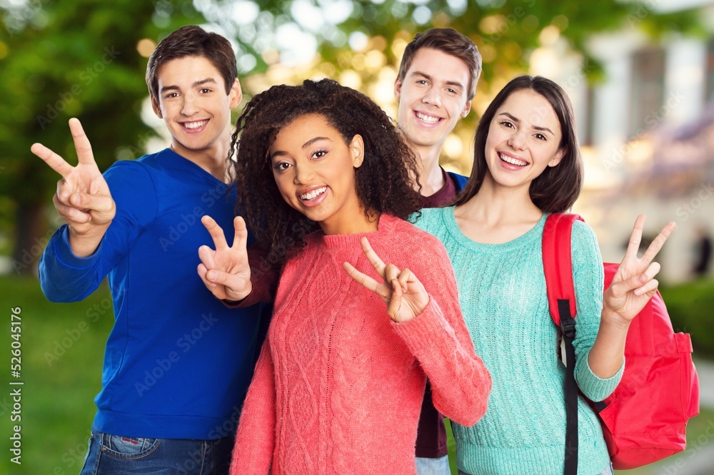 International guys and girls taking photo out side. Happy life style ...