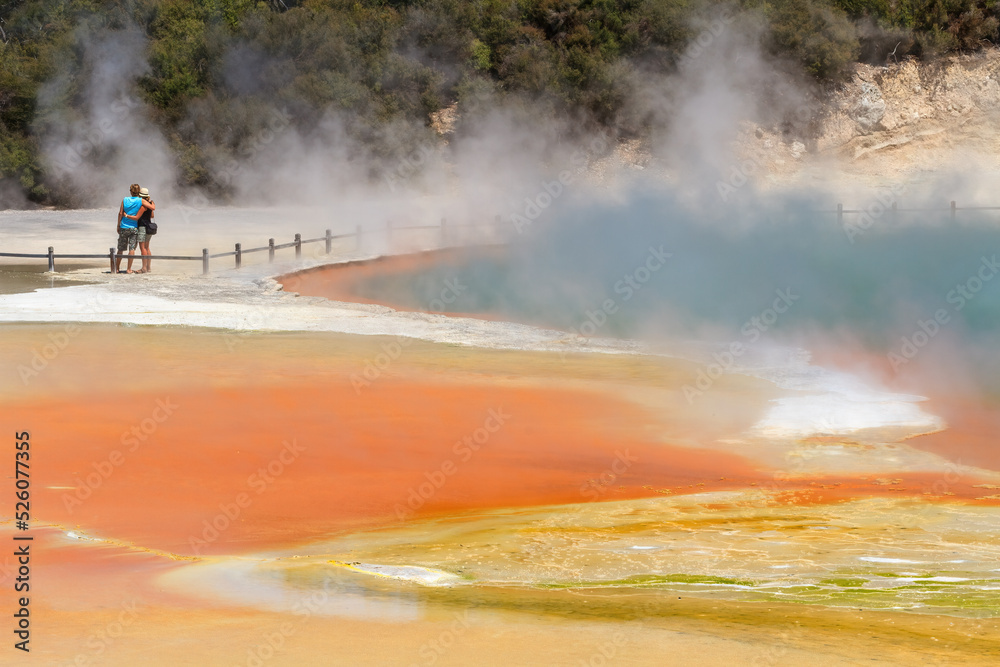 Steaming geothermal pools with colorful mineral deposits at Waiotapu ...