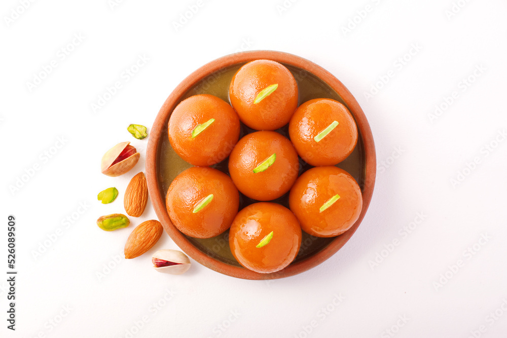 Indian sweet Gulab Jamun served in a round ceramic plate Stock Photo ...