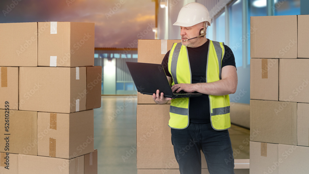 Logistic man. Employee of logistic company among boxes. Guy in ...