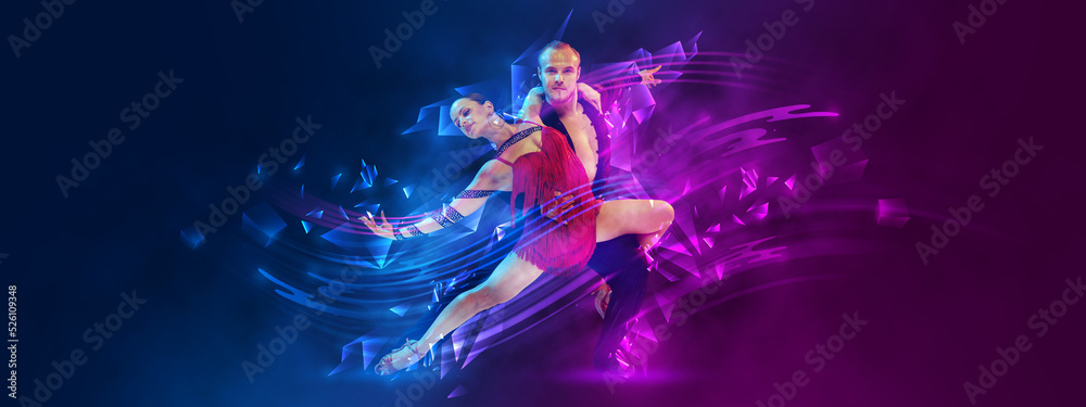 Emotional couple of dancers dancing samba, rumba, paso doble over dark ...