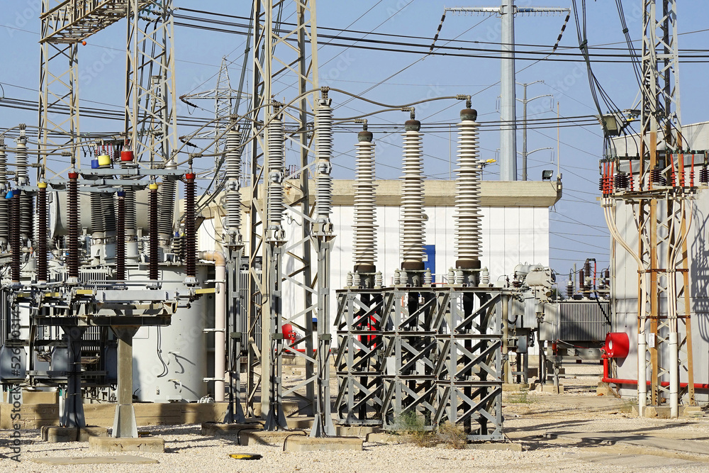 High-voltage substation. High voltage transformer. Electric current ...