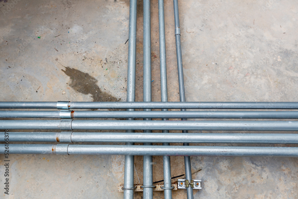 Installation of pipes, wires, electrical work in the building ...