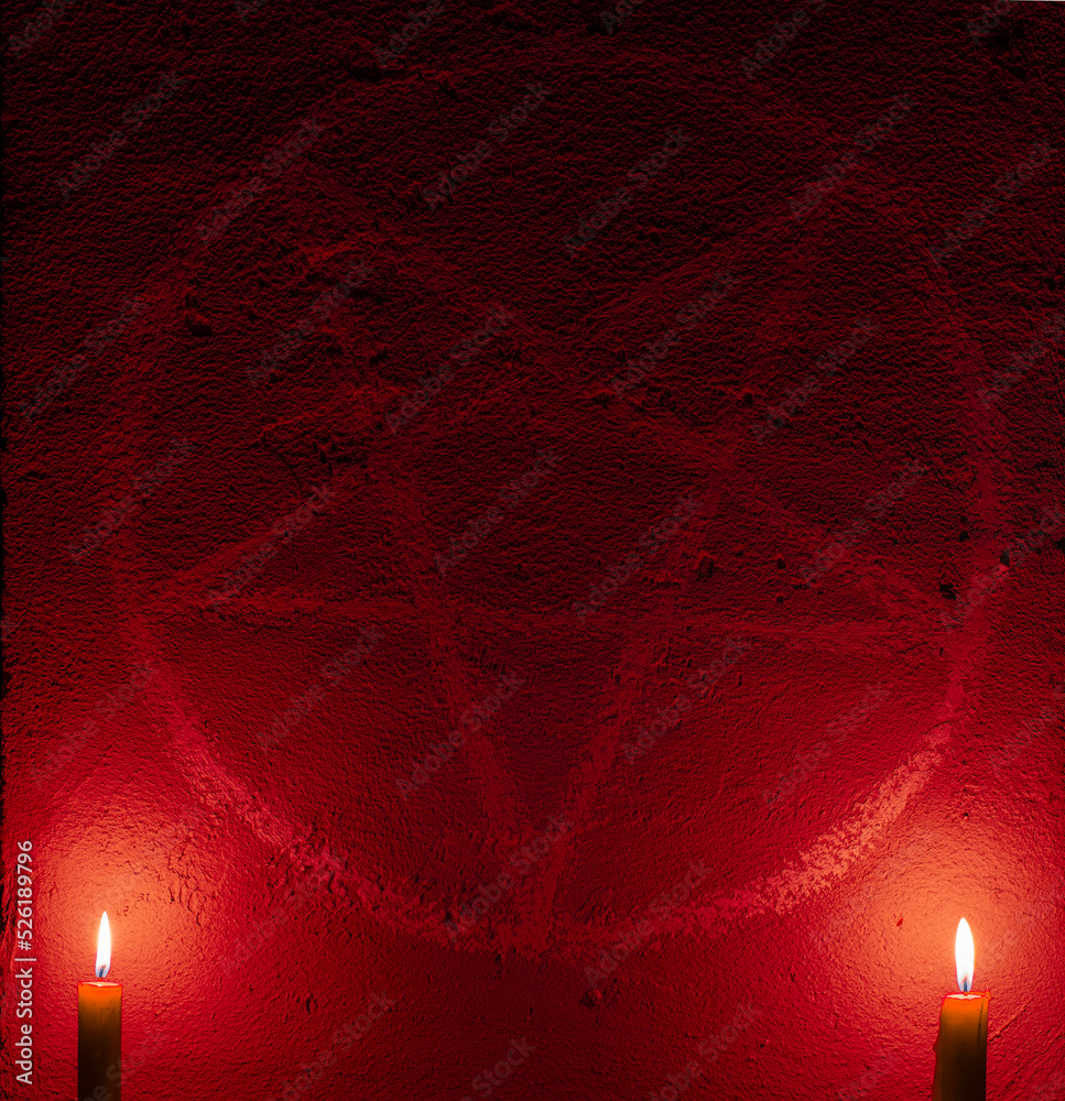 White pentagram symbol on concrete wall. Satanic altar illuminated with ...
