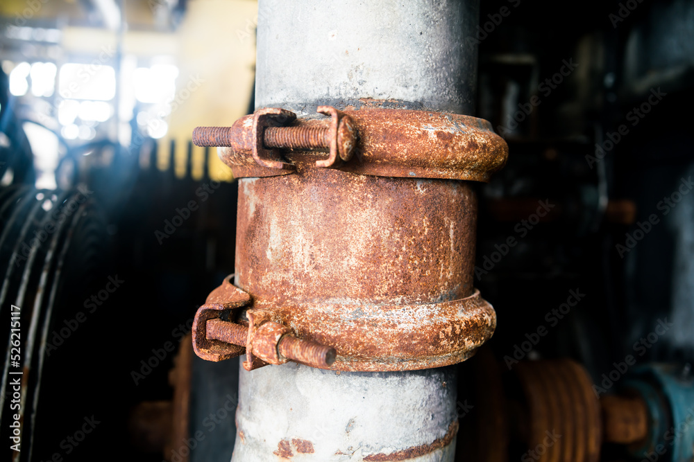 Steel pipe clamp with anti-rust paint peeling off the pipe surface ...
