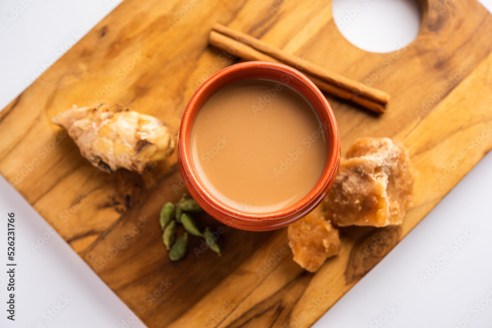 Jaggery tea or Gur ki chai with ingredients like gud, ginger or adrak ...