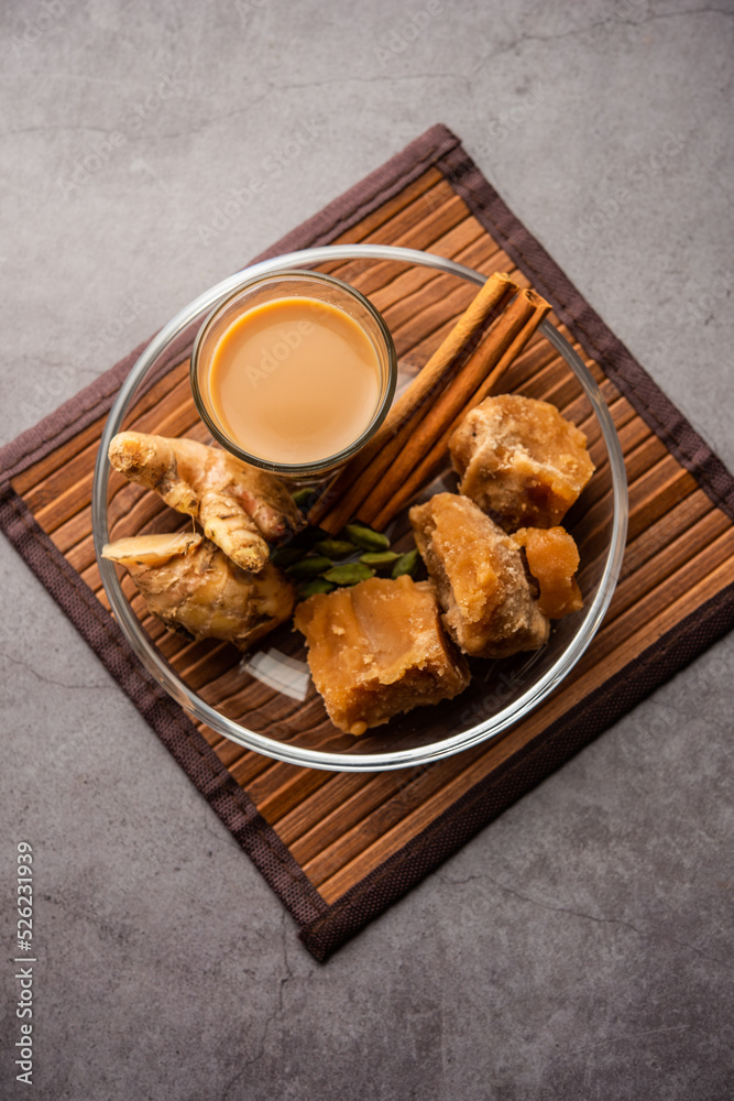 Jaggery tea or Gur ki chai with ingredients like gud, ginger or adrak ...