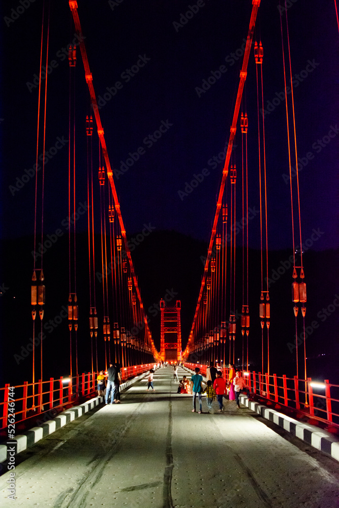 Colourful Dobra Chanti hanging bridge over Tehri Lake. Night view of ...