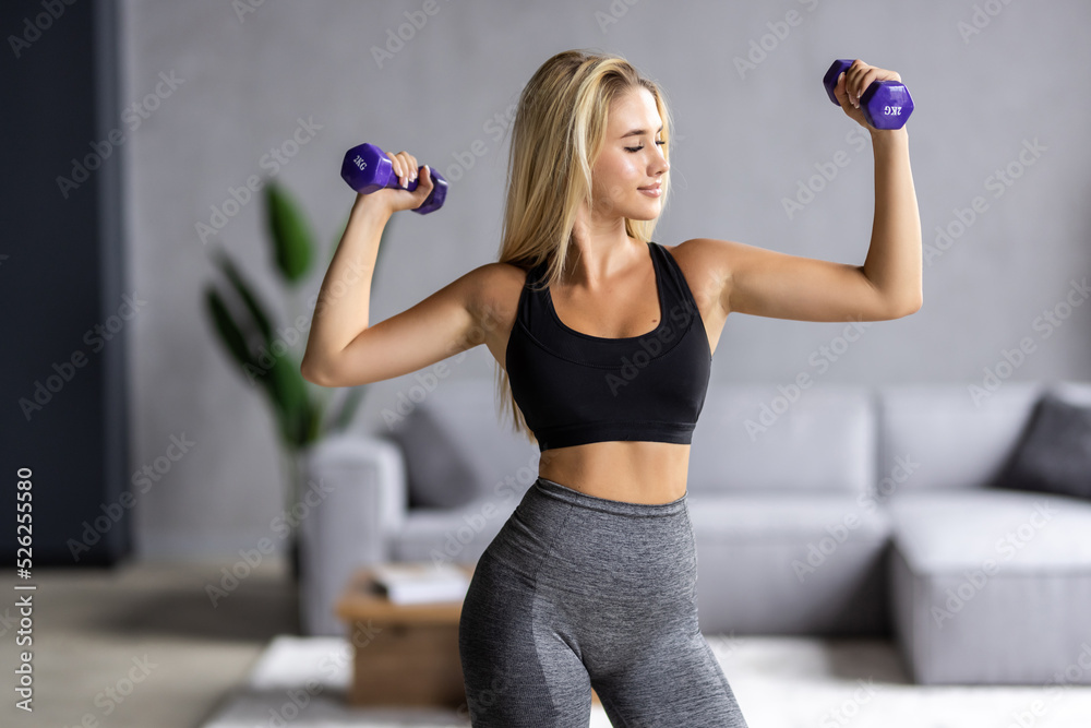 Portrait of beautiful young Indian woman keeping fit, training with ...