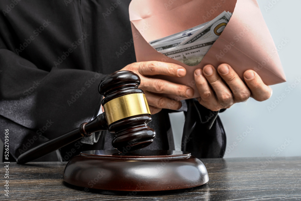 Judge and money concept. Judge's gavel on the table. Judge's hammer for ...