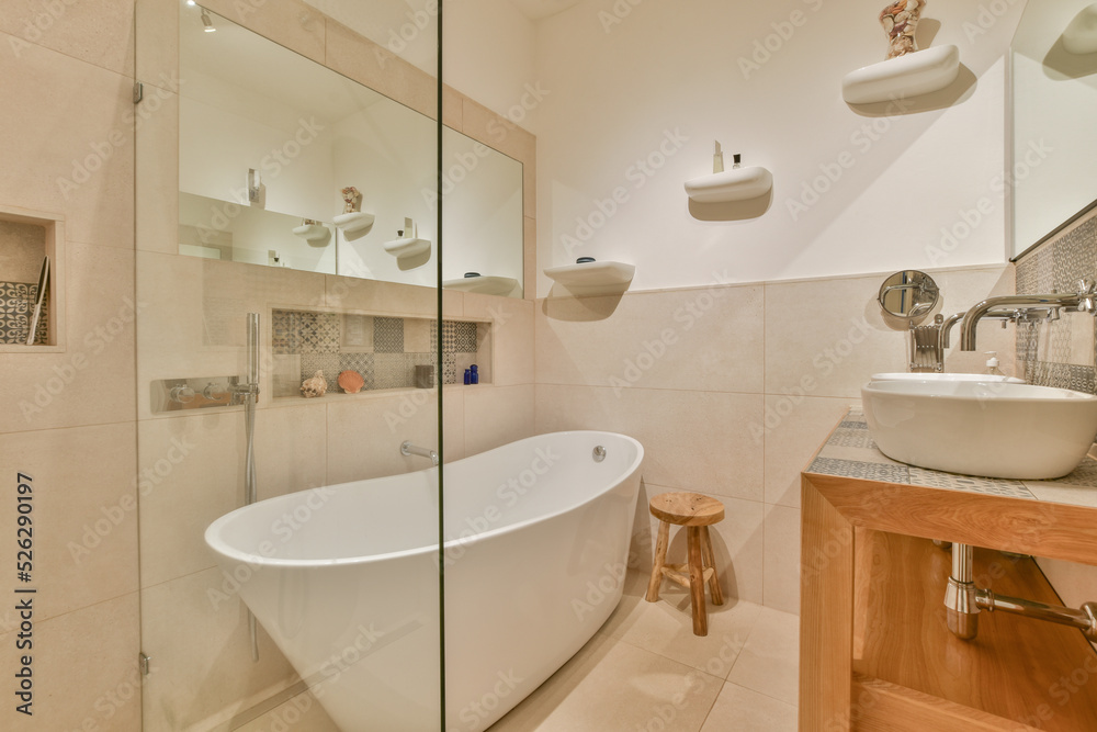 Modern home interior design of white bathroom with open bathtub and ...