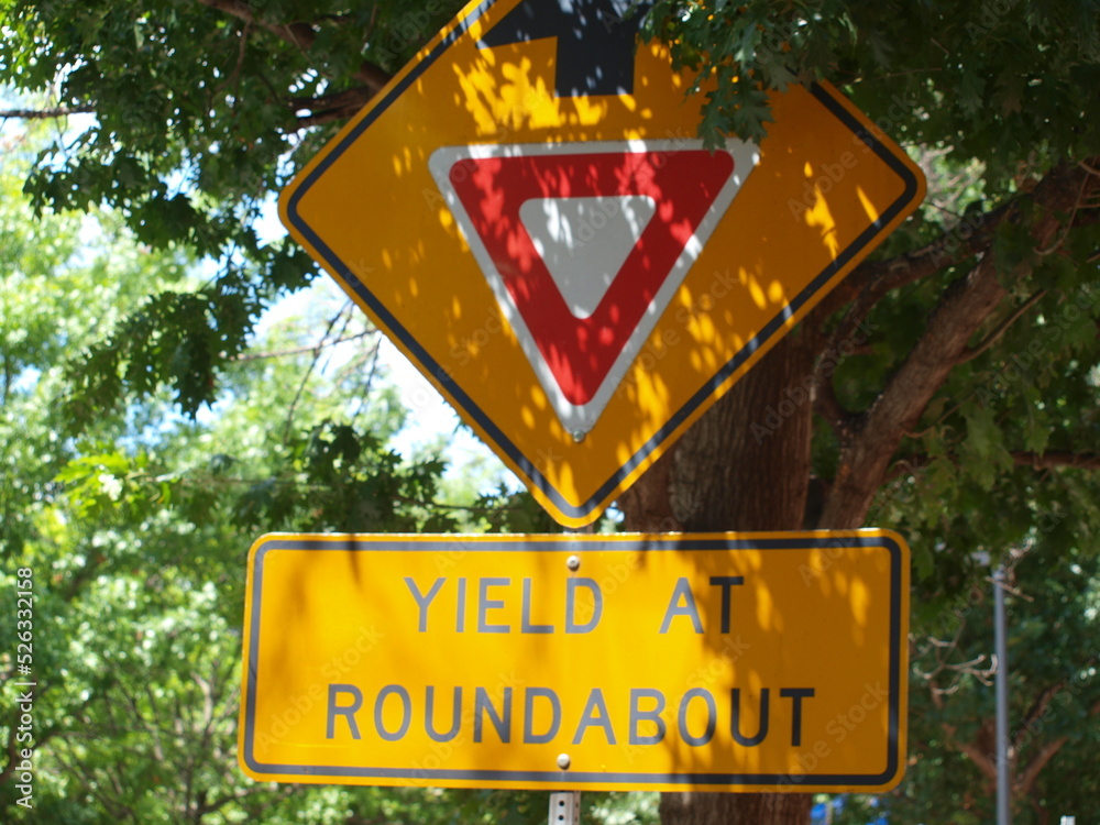 Traffic Sign Indicating Roundabout ahead Stock Photo | Adobe Stock
