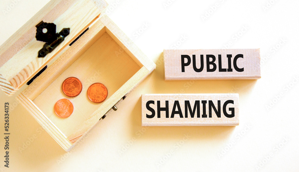 Public shaming symbol. Concept words Public shaming on wooden blocks on ...