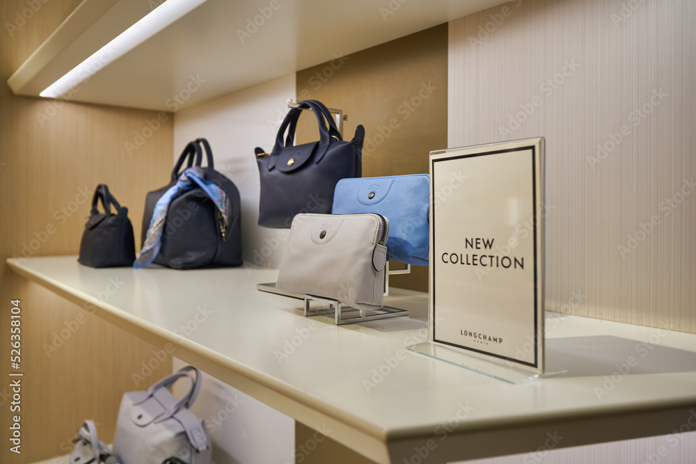 SINGAPORE - CIRCA JANUARY, 2020: bags on display at Longchamp store in ...
