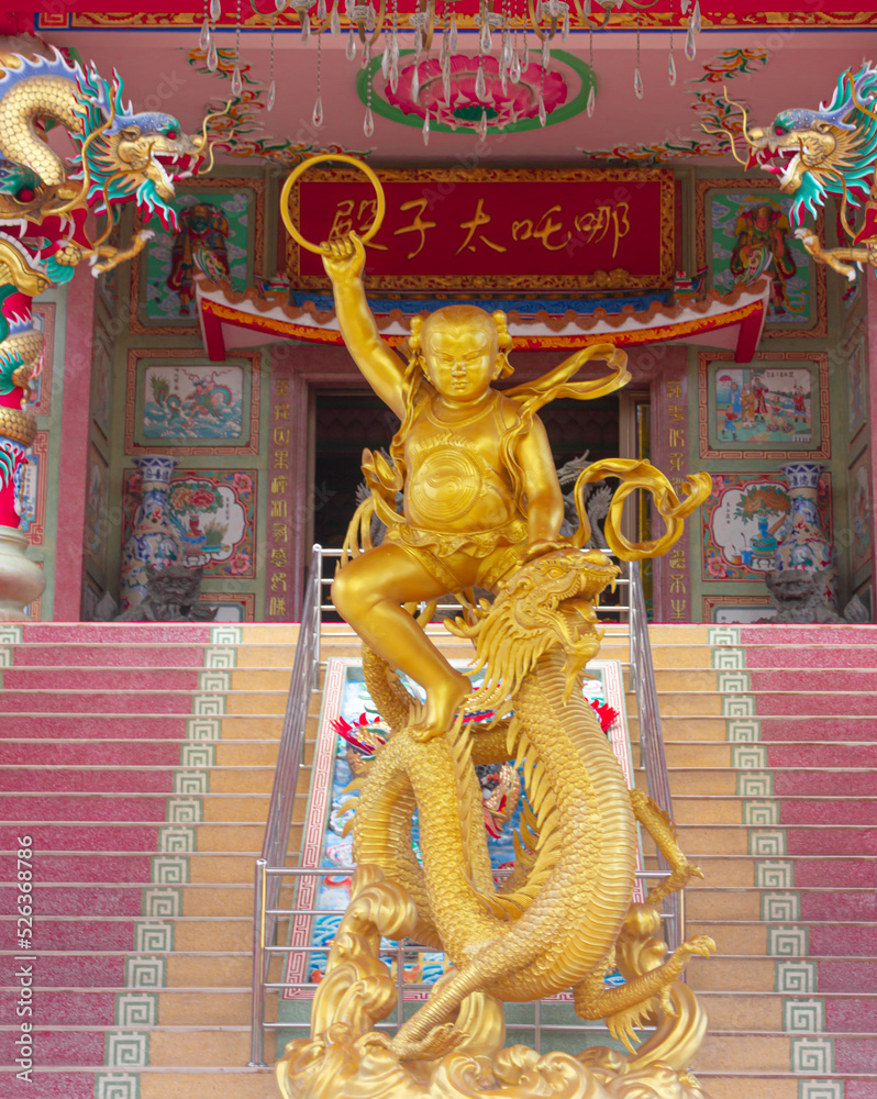 Chonburi, Thailand - 07,05,2019 : Beautiful golden statue of Na Zha ...