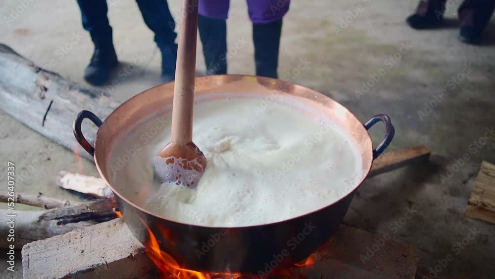 Traditional milk sweet called Manjar Blanco, typical food of Colombia ...