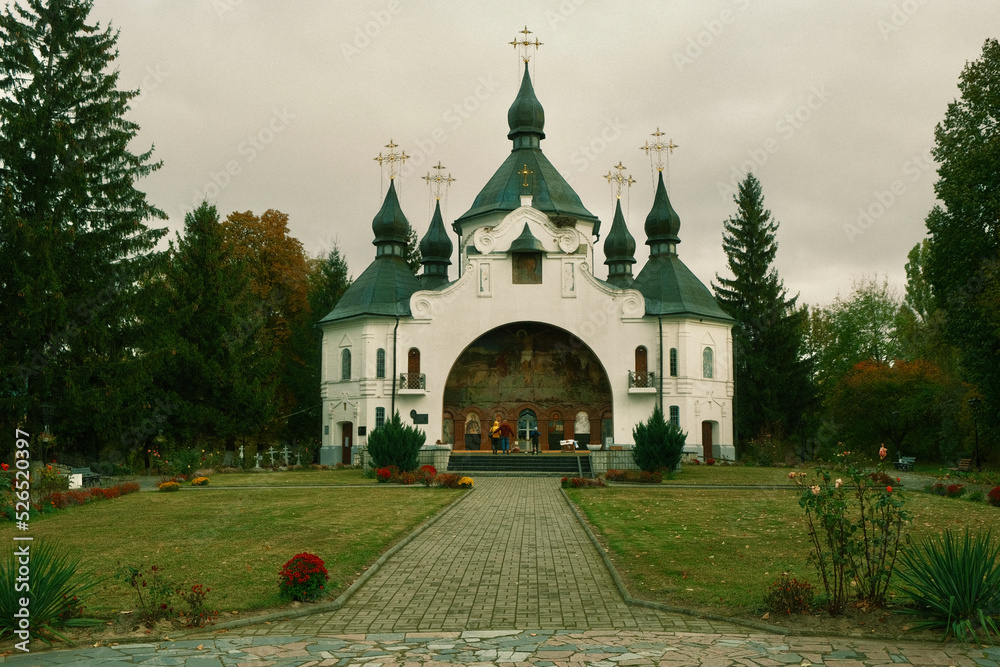 Ancient Cathedral. White wall of an old cathedral with windows and ...