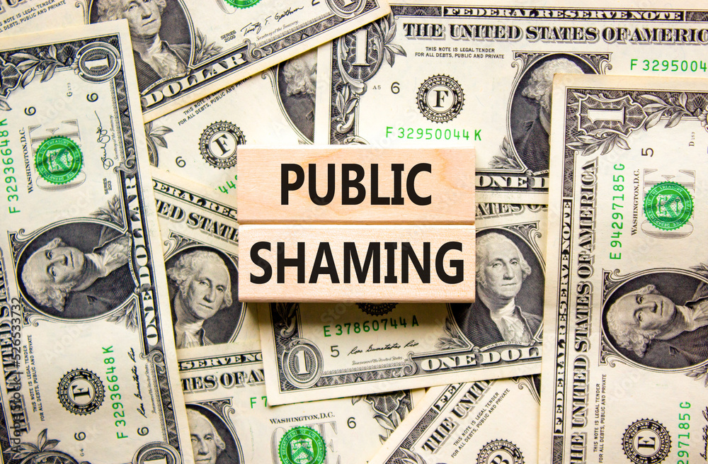 Public shaming symbol. Concept words Public shaming on wooden blocks on ...