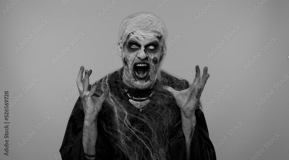 Scary man in carnival costume of Halloween crazy zombie with bloody ...