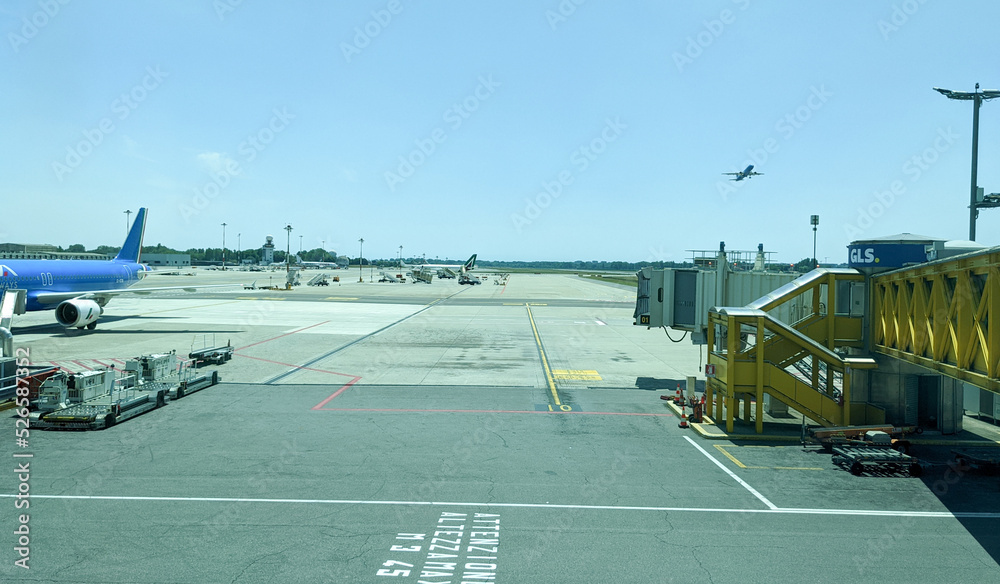 LINATE AIRPORT, ITALY - CIRCA JUNE 2022: airport operations in the ...