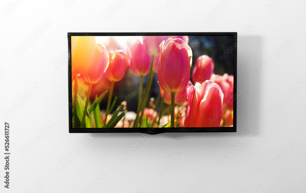TV monitor on the wall Stock Photo | Adobe Stock