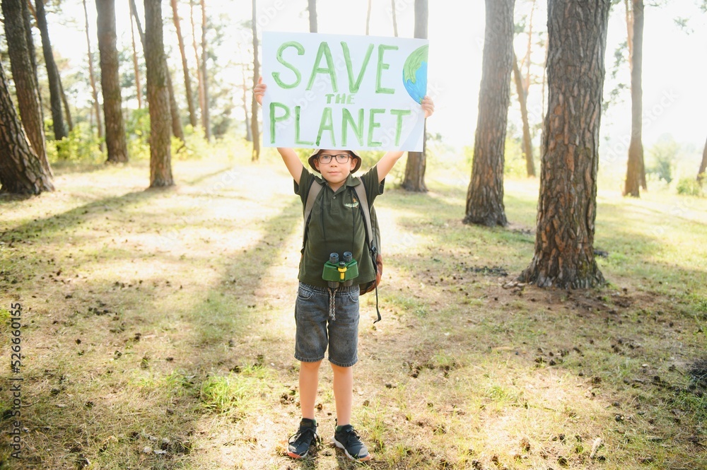 demonstration against global warming and pollution. Child boy making ...