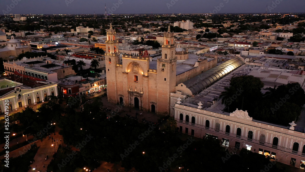 Aerial camera at night showing the front of the Cathedral of Merida ...