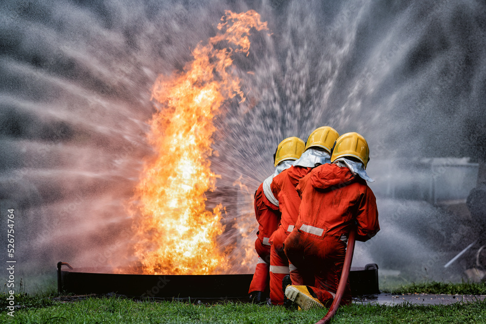 In Industry safety fire fighter team department on training fight with ...
