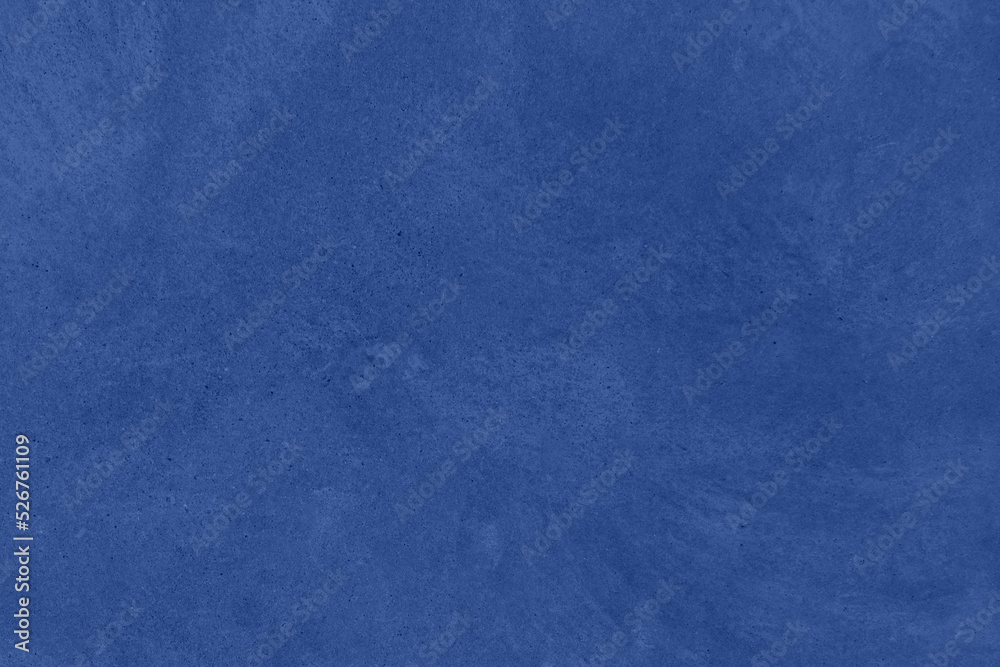 Saturated dark blue colored low contrast Concrete textured background ...