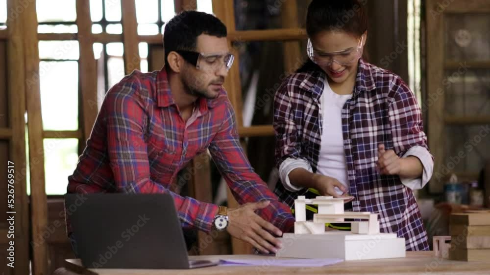 concept blue collar worker. carpenter is designing furniture models in ...