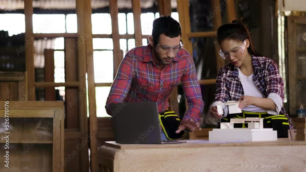 concept blue collar worker. carpenter is designing furniture models in ...