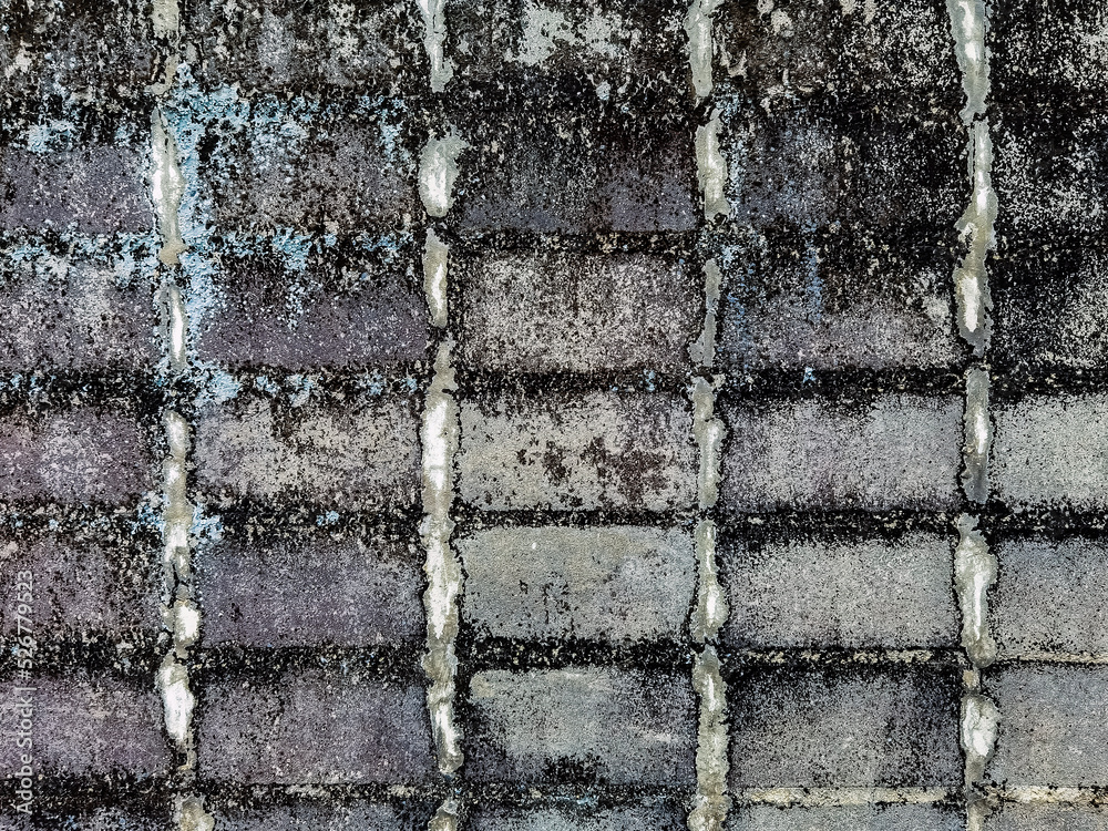 Dirty old eroded cracked plaster cement block fence. Concrete block ...