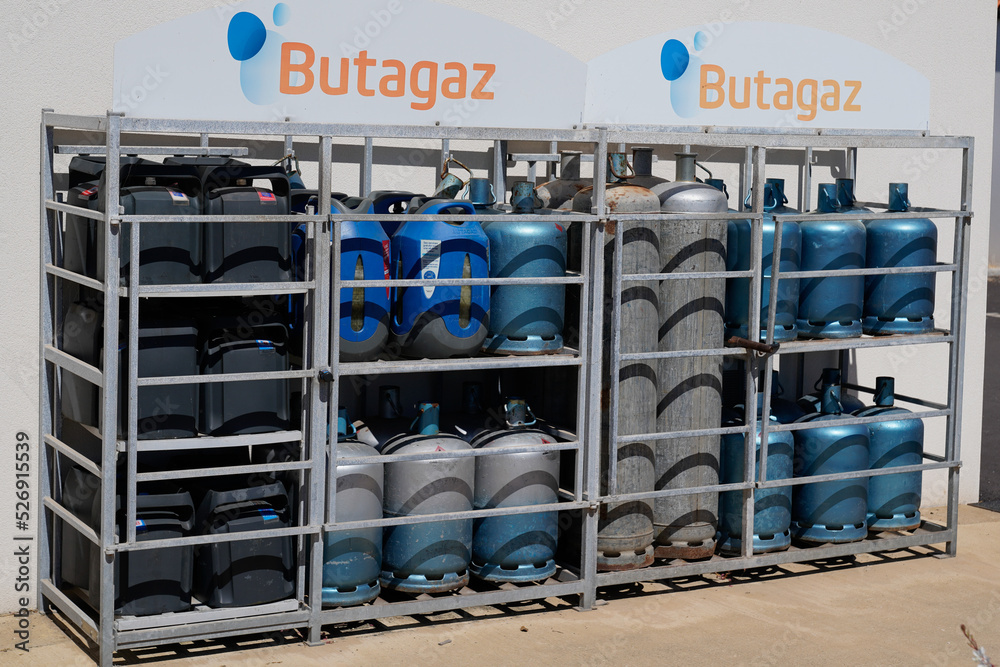 Butagaz logo sign and text brand on steel cage for presentation and ...