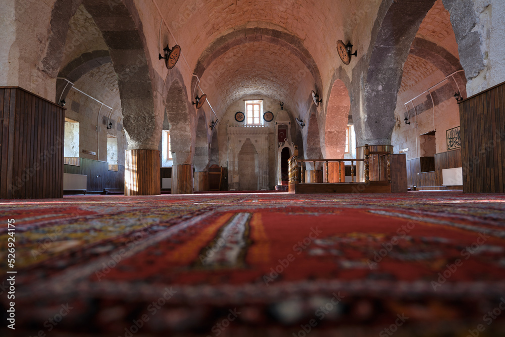 interior of the old mosque, red carpet mosque.Inside the mosque, low ...