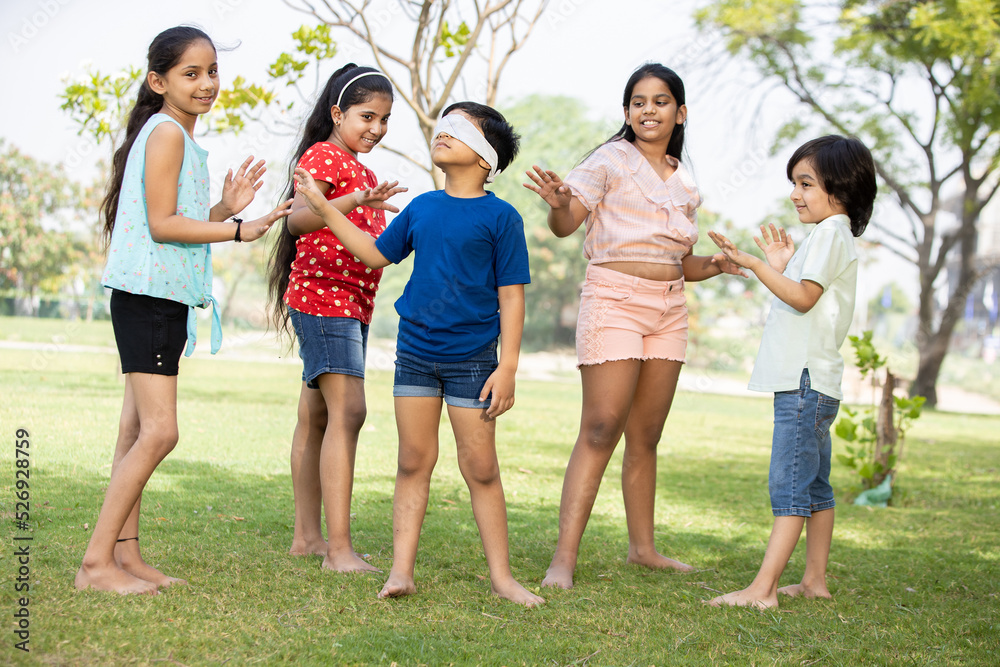 Indian Children Playing In Garden